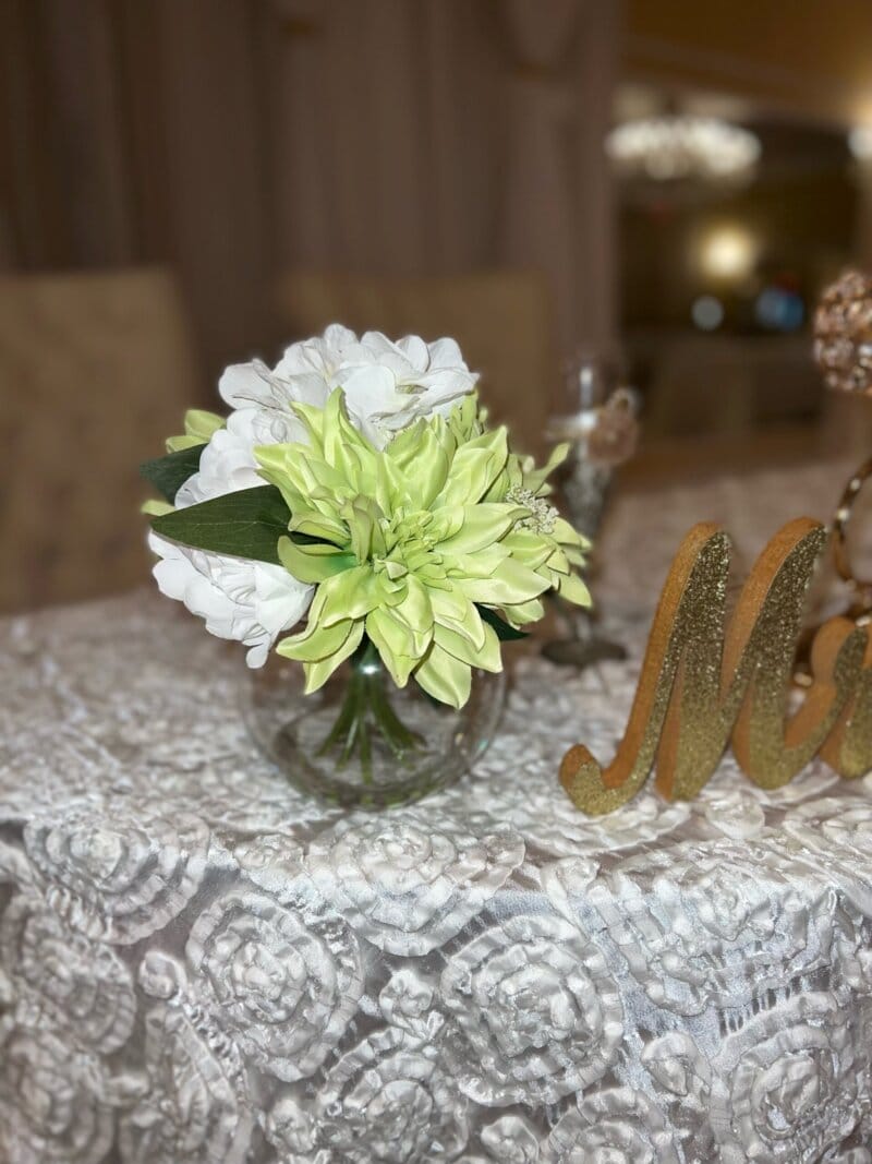 Sweetheart Table - Green & White Flowers in a Glass Vase - Falls Manor ...